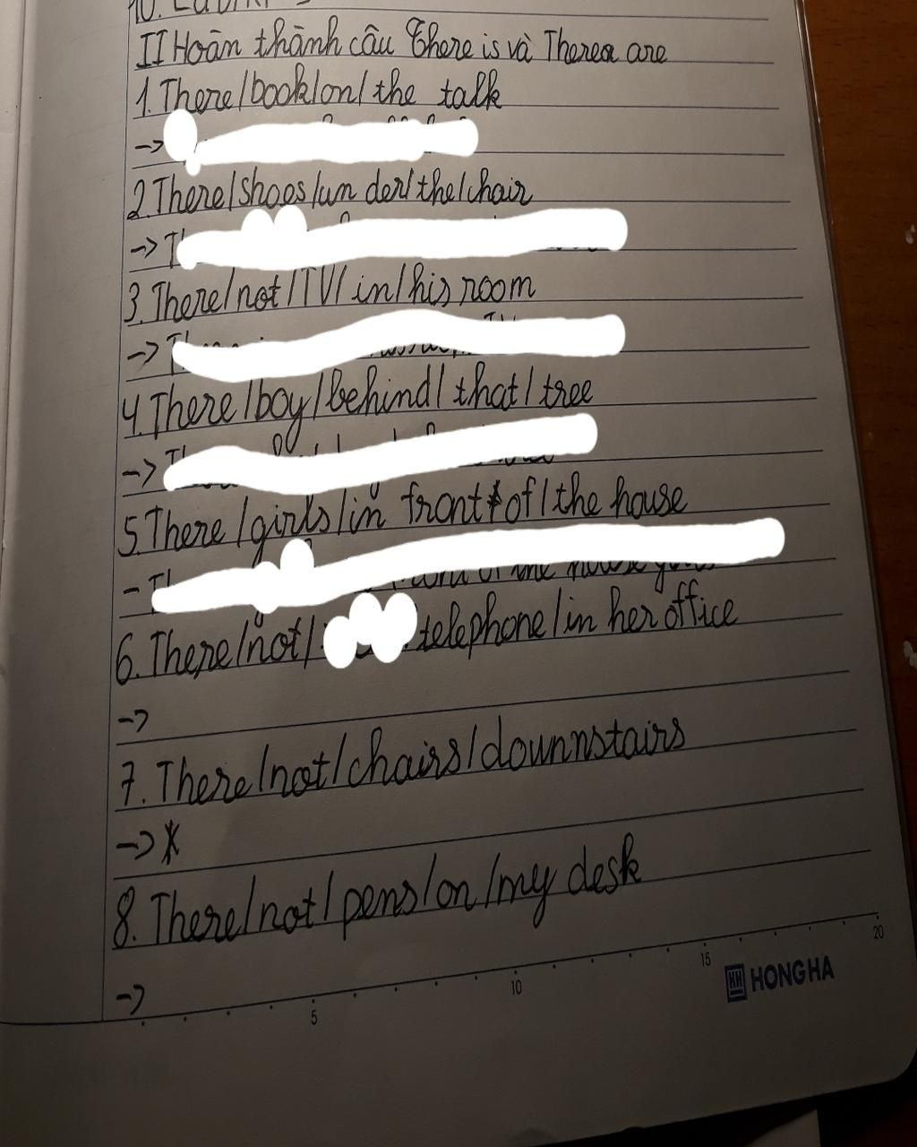 II Hoàn thành câu Shere is và There are 1. There / booklon/ the talk ...