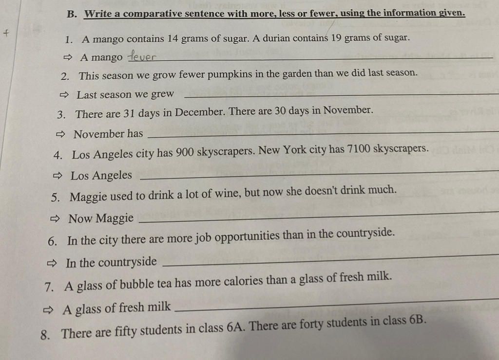 f B. Write a comparative sentence with more, less or fewer, using the ...