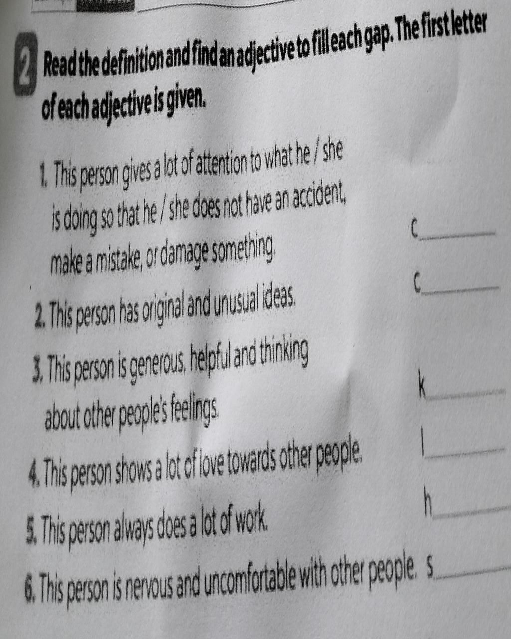 2 Read the definition and find an adjective to fill each gap. The first ...