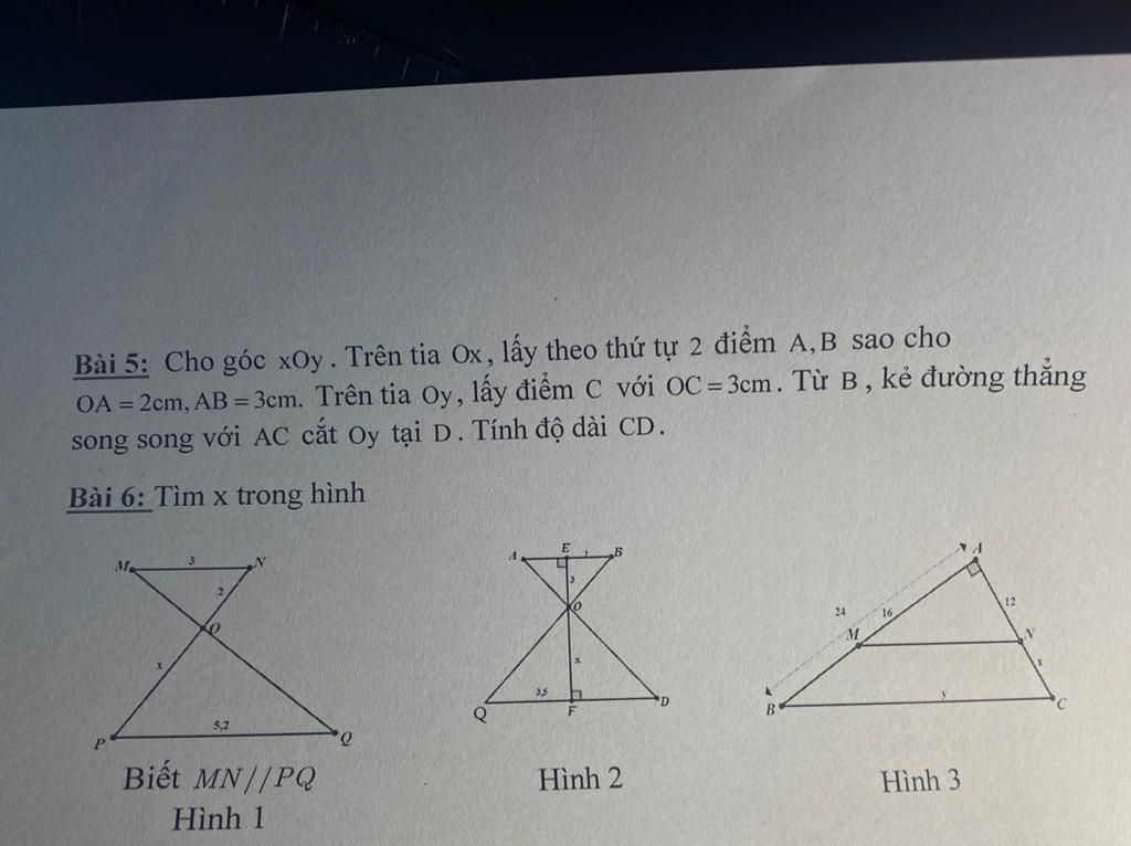 Bài 5: Cho góc xOy . Trên tia Ox, lấy theo thứ tự 2 điểm A,B sao cho OA = 2cm, AB=3cm. Trên tia ...