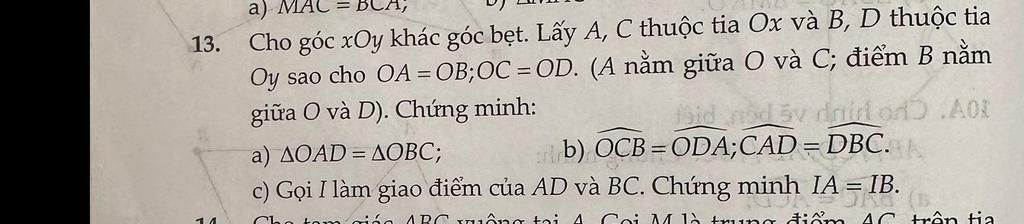 13. a) Cho góc xOy khác góc bẹt. Lấy A, C thuộc tia Ox và B, D thuộc tia Oy sao cho OA=OB;OC =OD ...