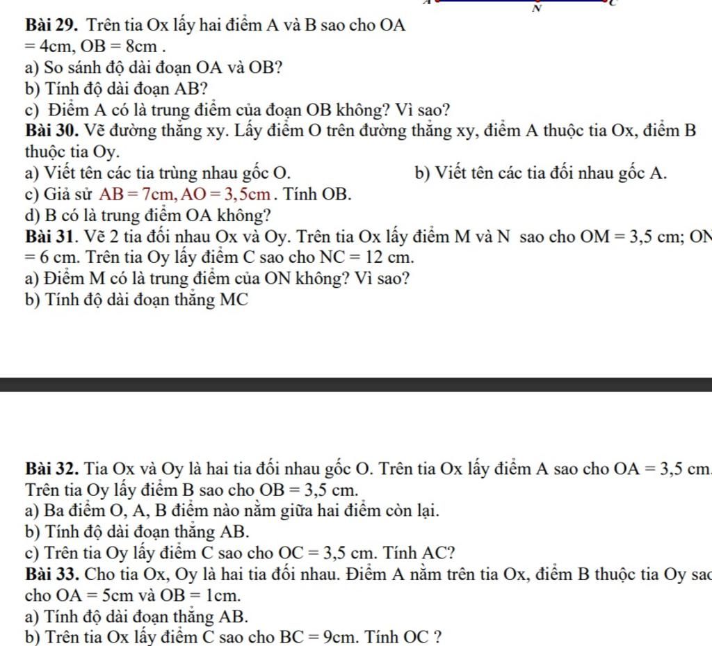 N Bài 29. Trên tia Ox lấy hai điểm A và B sao cho OA = 4cm, OB = 8cm. a) So sánh độ dài đoạn OA ...