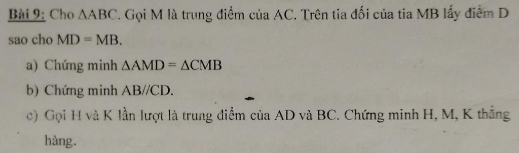 Bài 9: Cho AABC. Gọi M là trung điểm của AC. Trên tia đối của tia MB ...