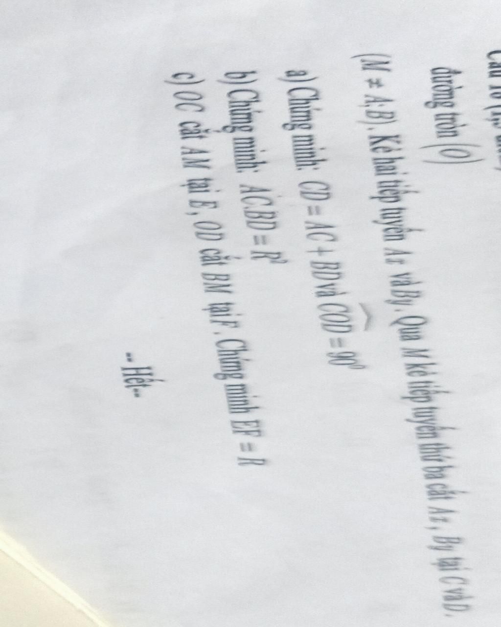 đường tròn (0) (M = AB. Kẻ hai tiếp tuyến At và ly. Qua M kẻ tin tuyển ...